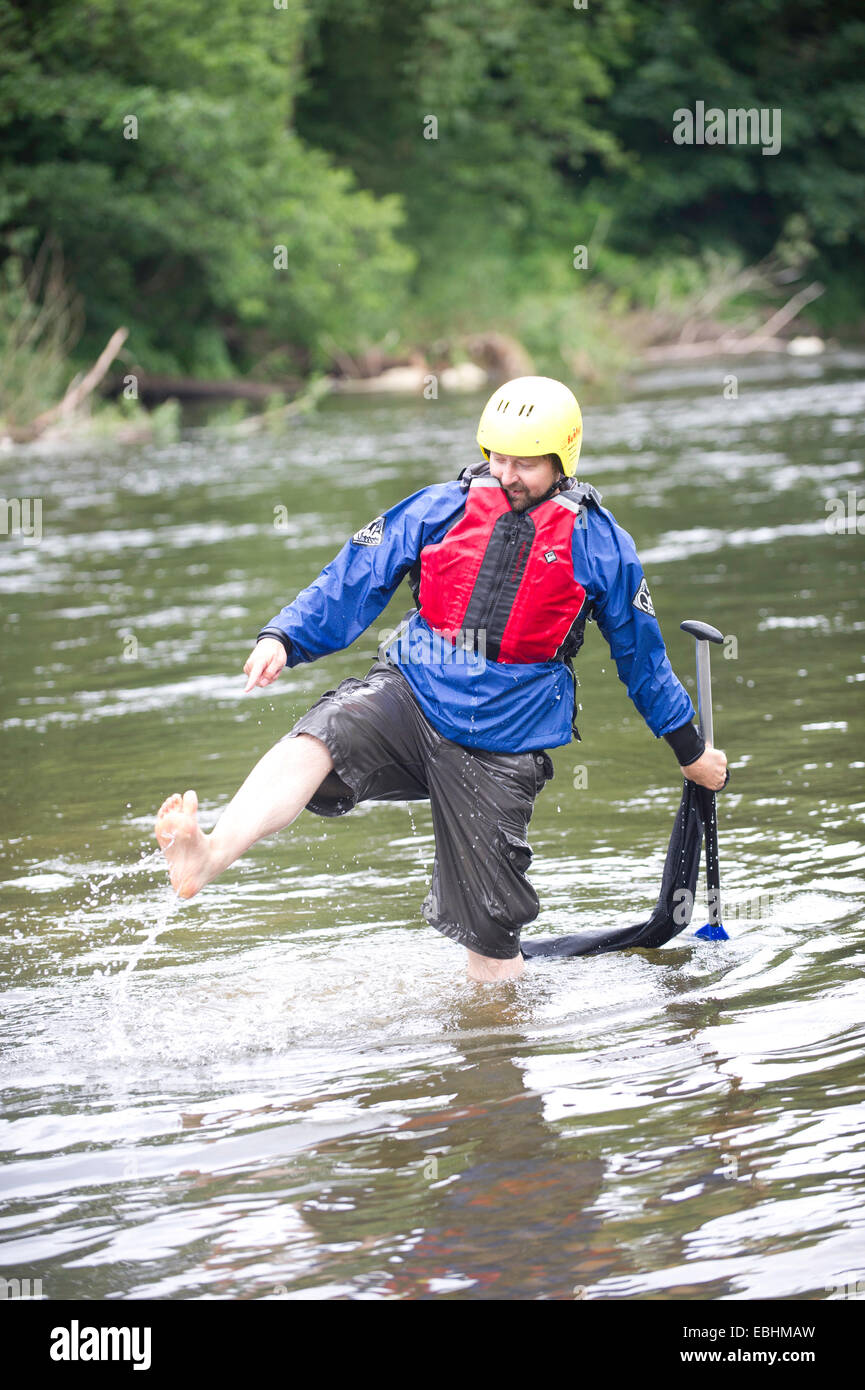 A canoeist falling into the river Wye Wales Stock Photo - Alamy