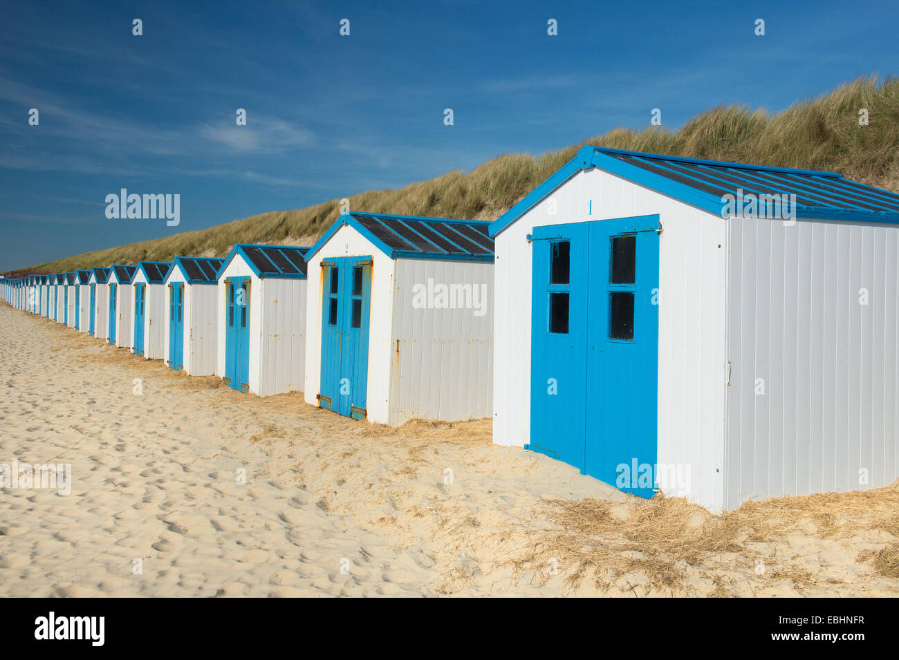 Row blue and white beach cabins for vacation surpose Stock Photo - Alamy