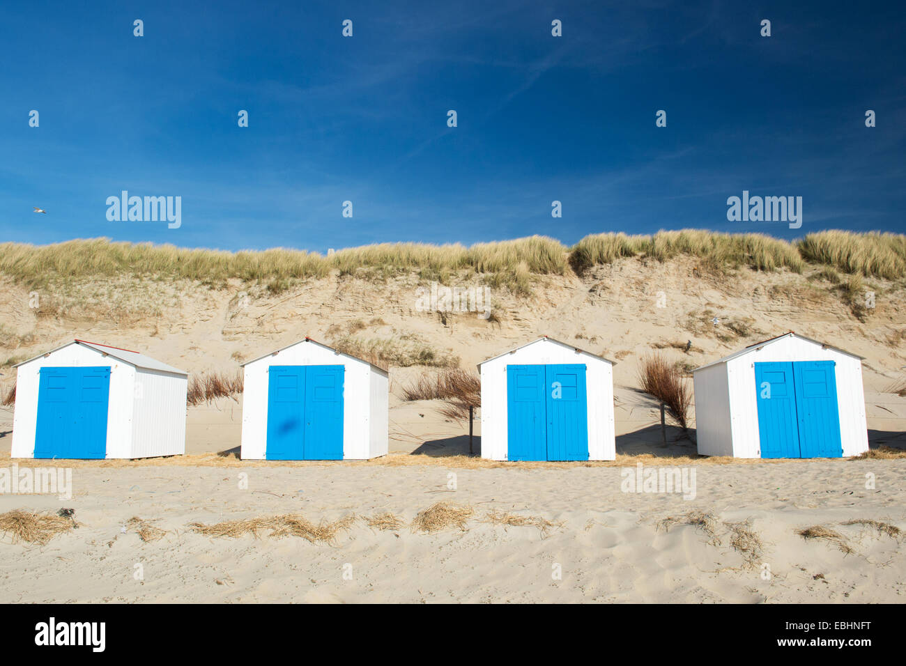 Row blue and white beach cabins for vacation surpose Stock Photo - Alamy
