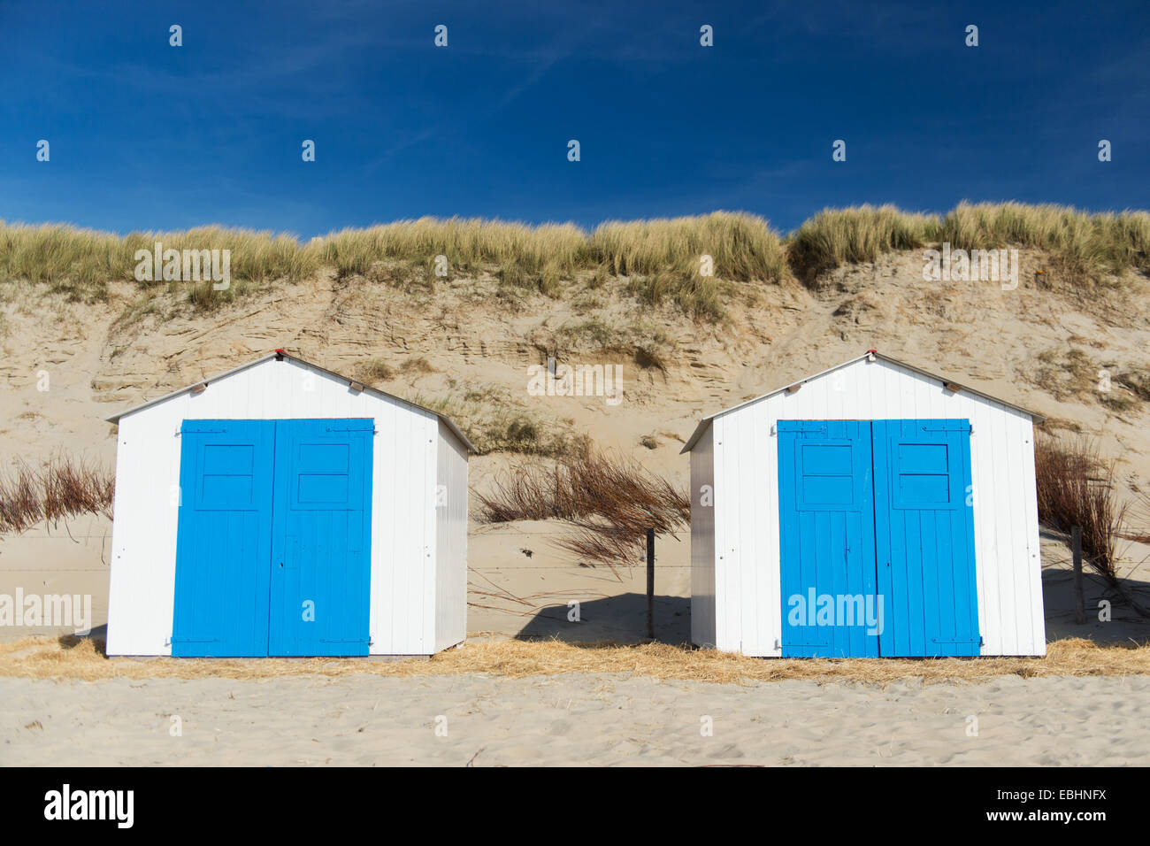 Row blue and white beach cabins for vacation surpose Stock Photo - Alamy