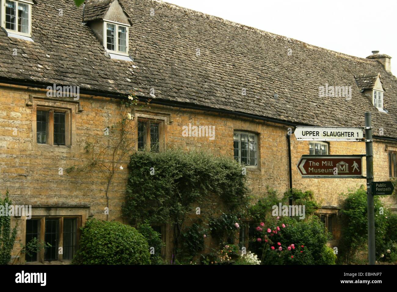 Lower Slaughter Sign post to Upper Slaughter and The Water Mill Stock ...
