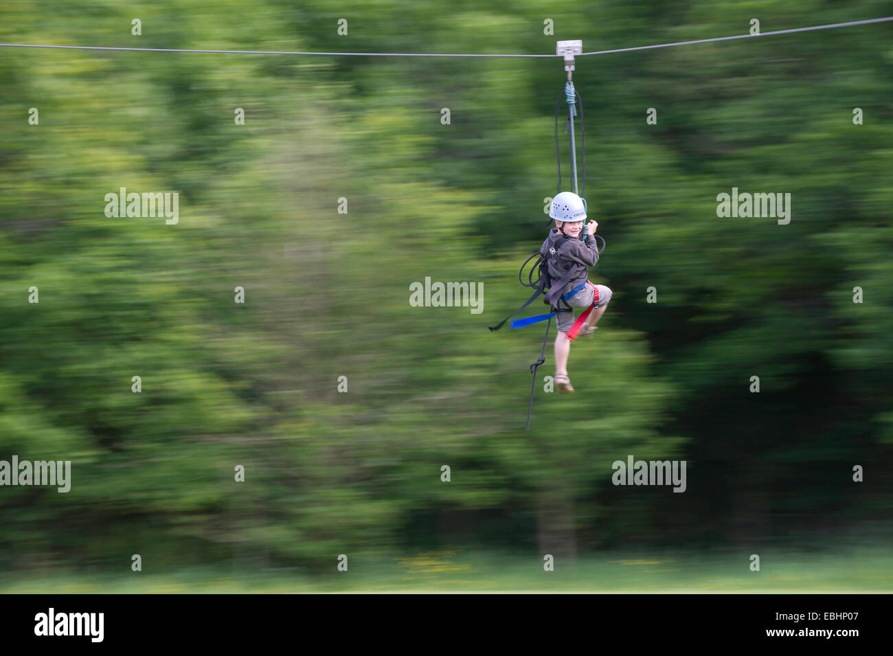 A child on a zipwire Stock Photo - Alamy