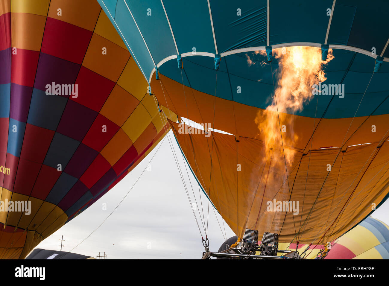 close up of a hot air ballon flame heating the air inside of the ...