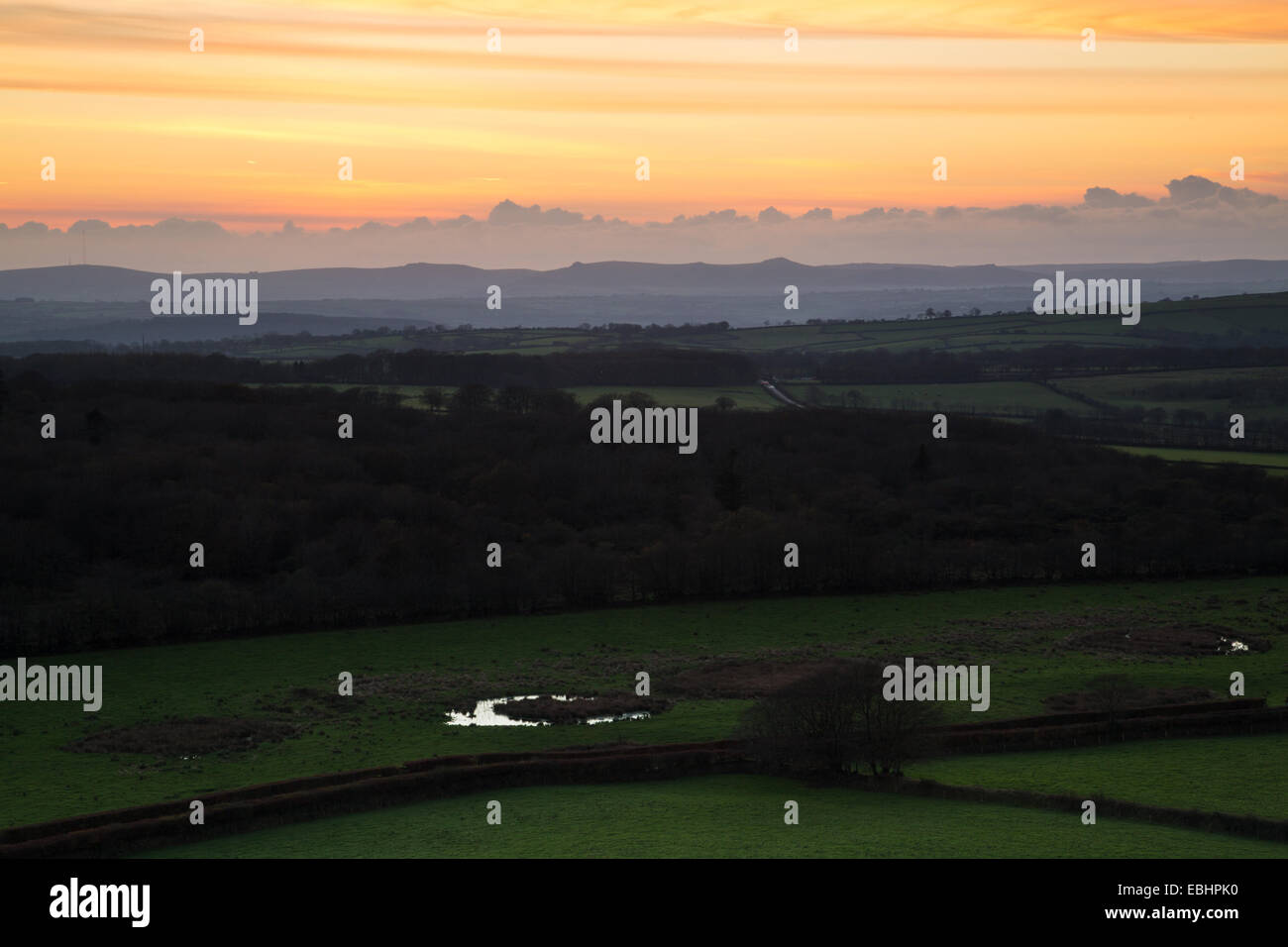 Sunset from Brentor looking towards Cornwall Stock Photo - Alamy