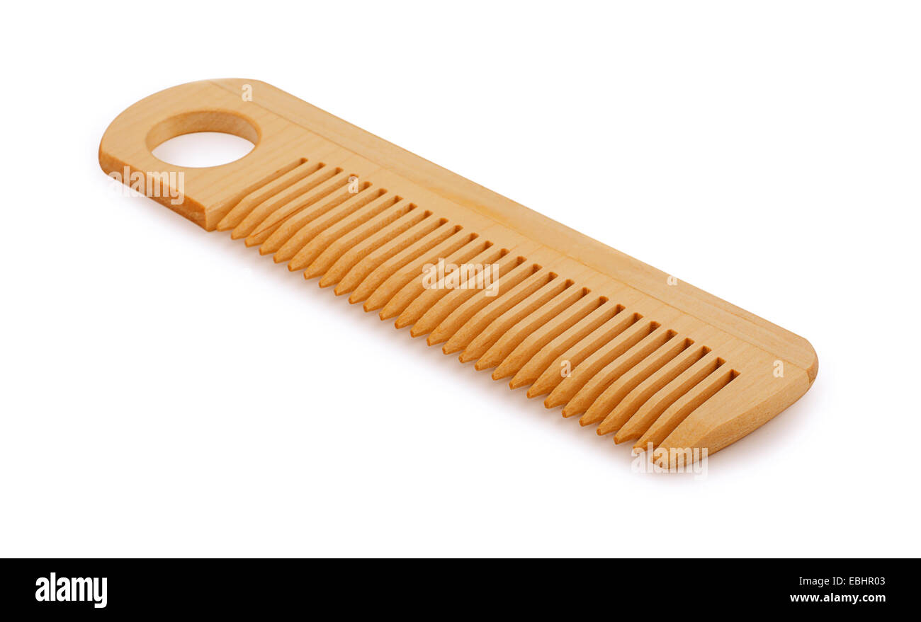 Wooden comb on a white background Stock Photo - Alamy