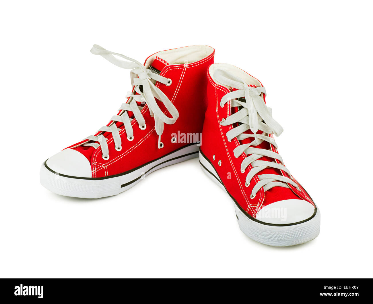 Red sneakers on a white background Stock Photo - Alamy