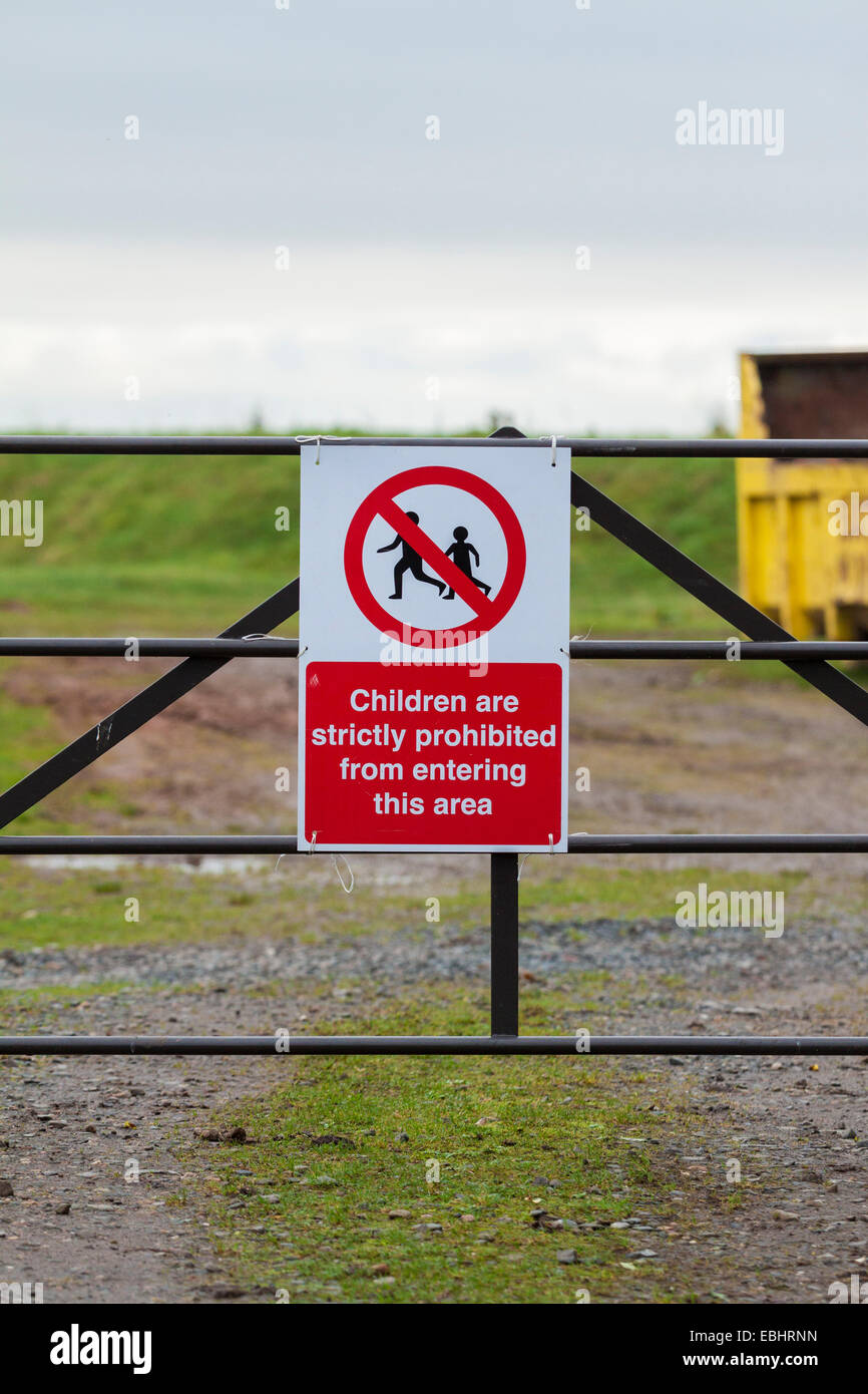 Sign on gate "Children are strictly prohibited from entering this area ...