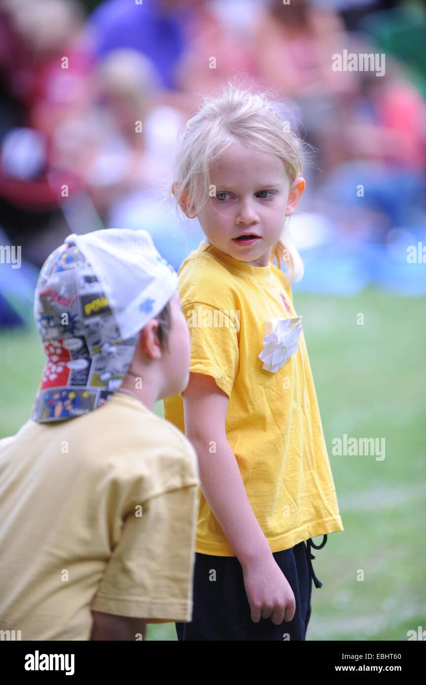 Child taking advice from friend Stock Photo - Alamy