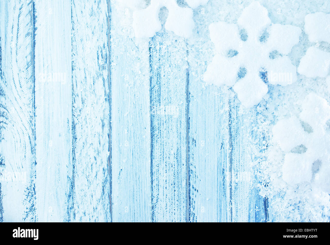 snowfolk and snow on white wooden background Stock Photo - Alamy
