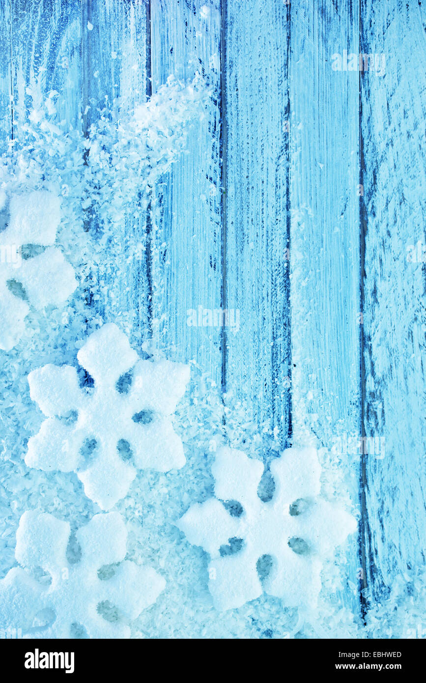 snowfolk and snow on white wooden background Stock Photo - Alamy