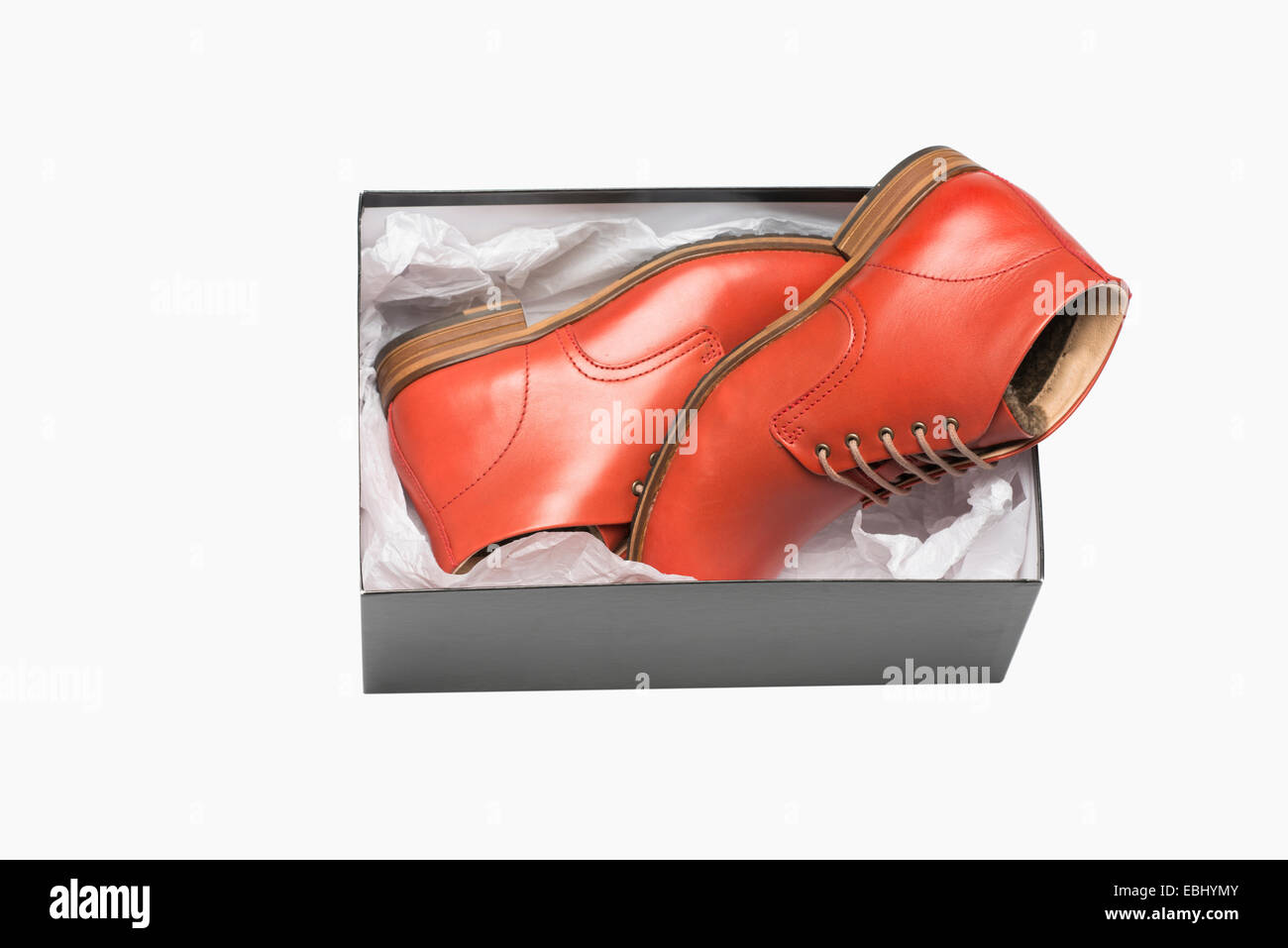 new red shoes in box with wrapping paper Stock Photo - Alamy