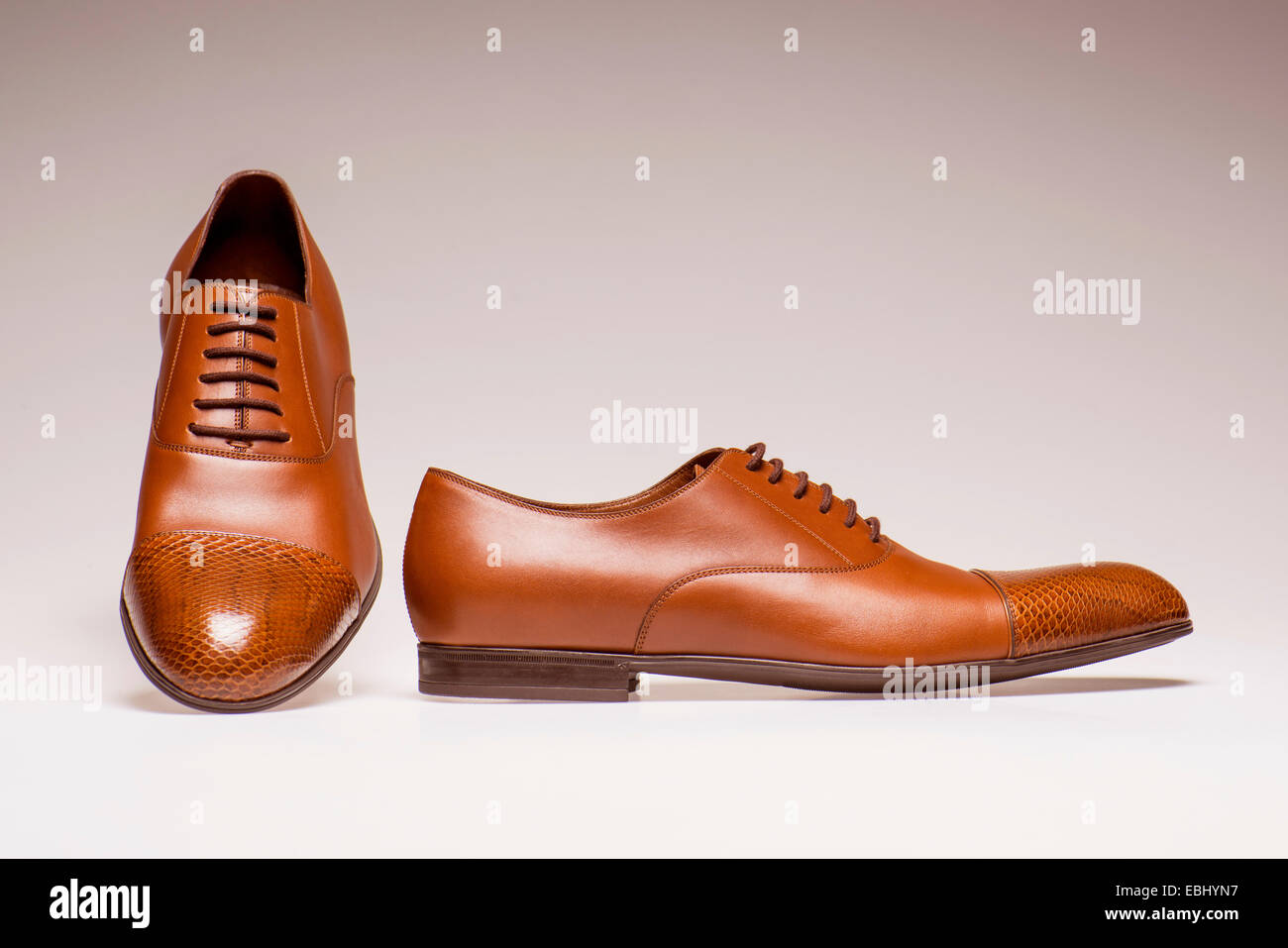 Pair of Men's Shoes isolated on white background Stock Photo - Alamy
