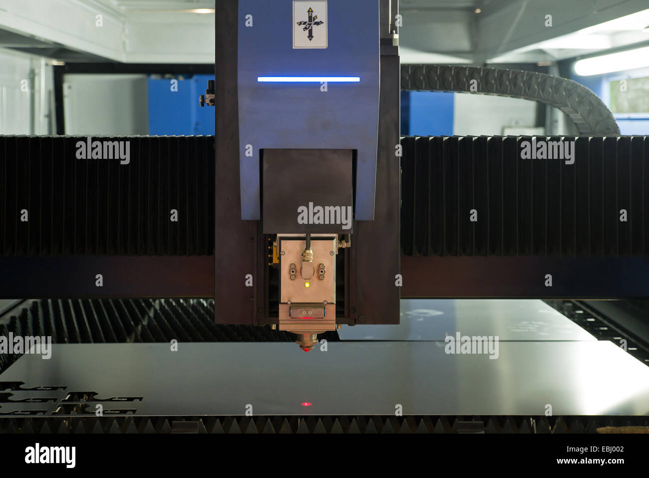 Laser Cutting machine working in factory Stock Photo - Alamy