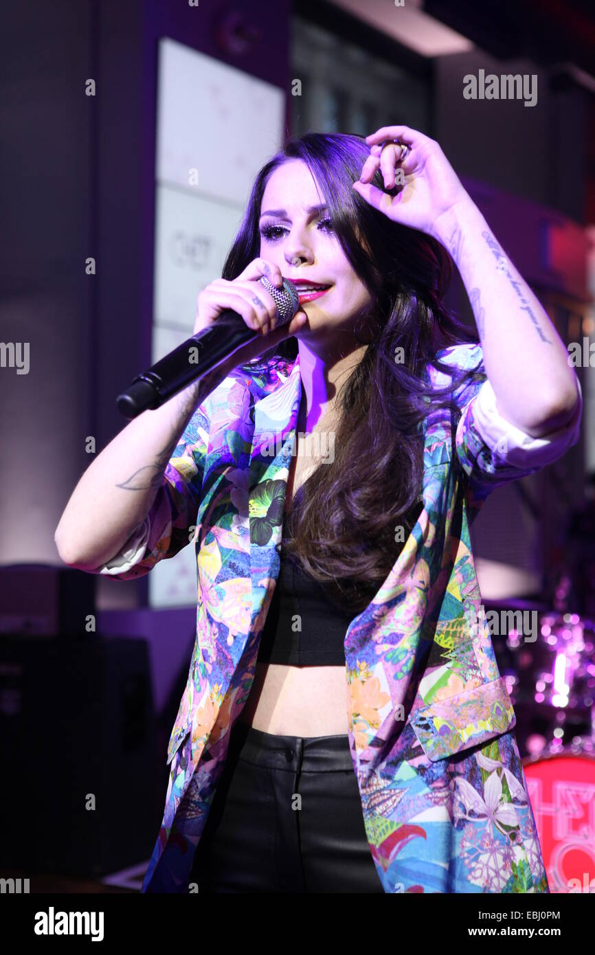 Singer-songwriter Cher Lloyd performs at MLB Fan Cave 2014 Concert ...