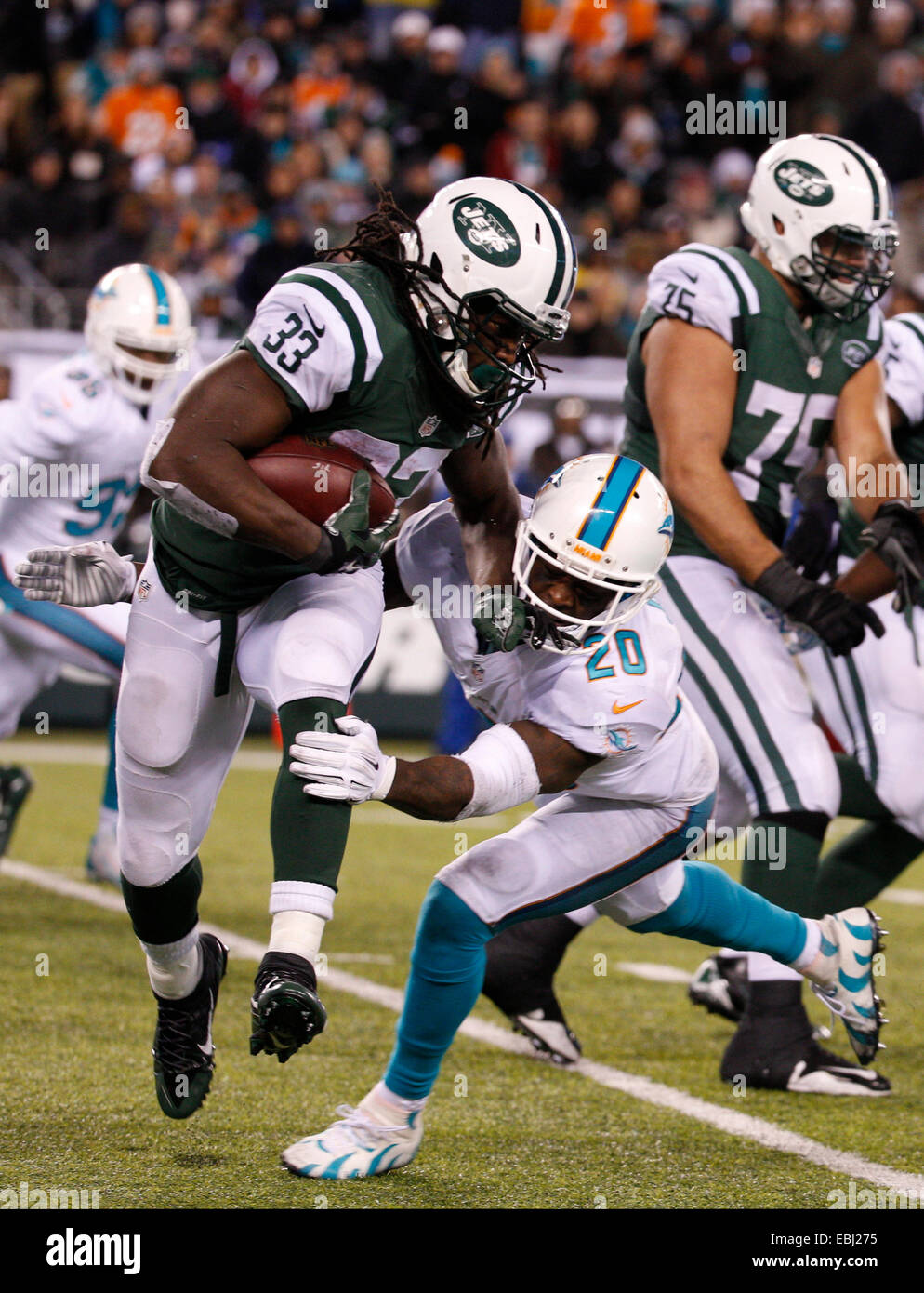 December 1, 2014: New York Jets running back Chris Ivory (33) runs with ...