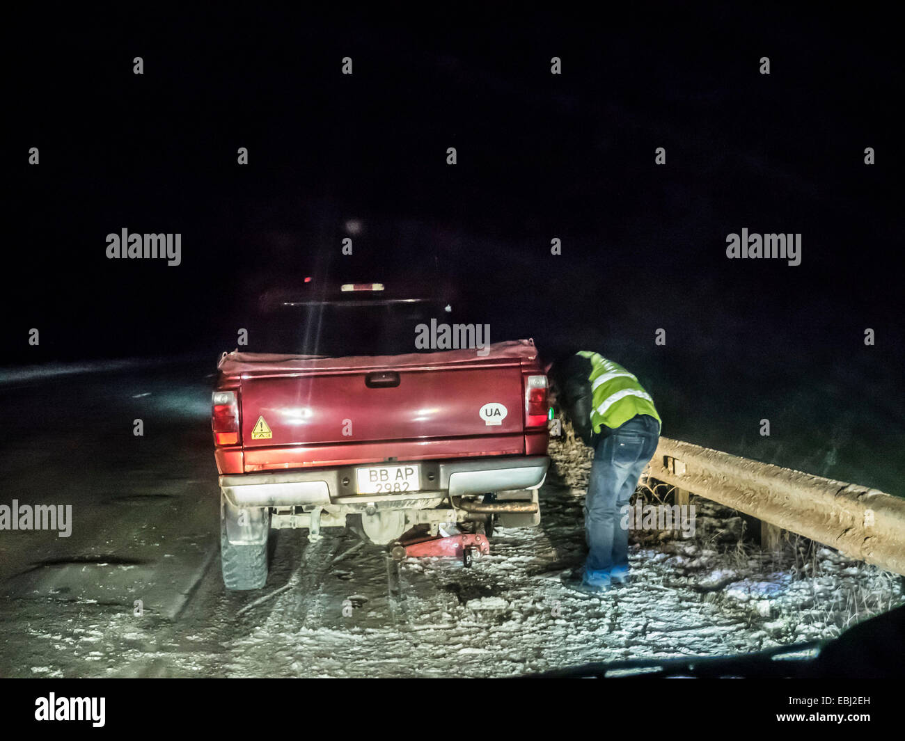 Truck Ford Ranger was evacuated after the breakdown on the winter road ...