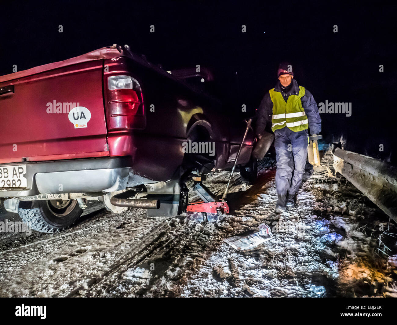 Truck Ford Ranger was evacuated after the breakdown on the winter road ...