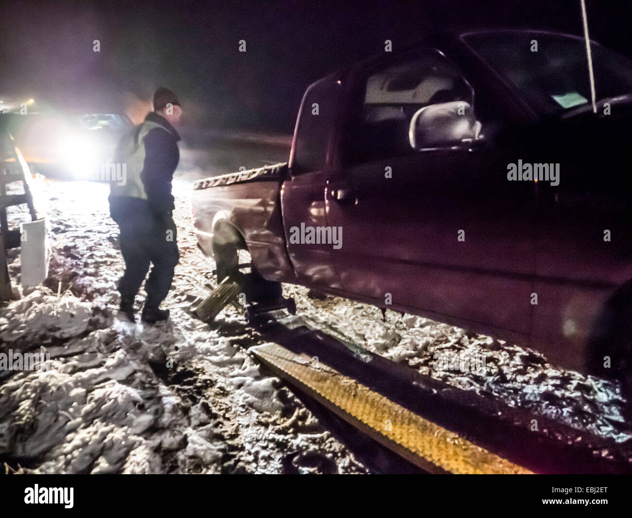 Truck Ford Ranger was evacuated after the breakdown on the winter road ...