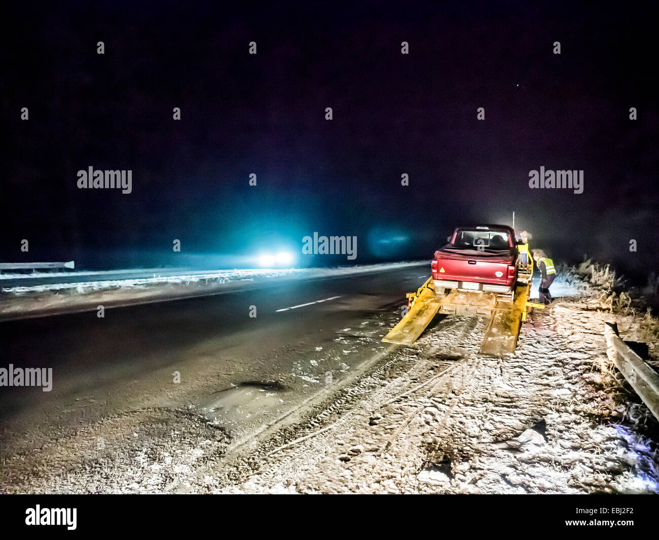 Truck Ford Ranger was evacuated after the breakdown on the winter road ...