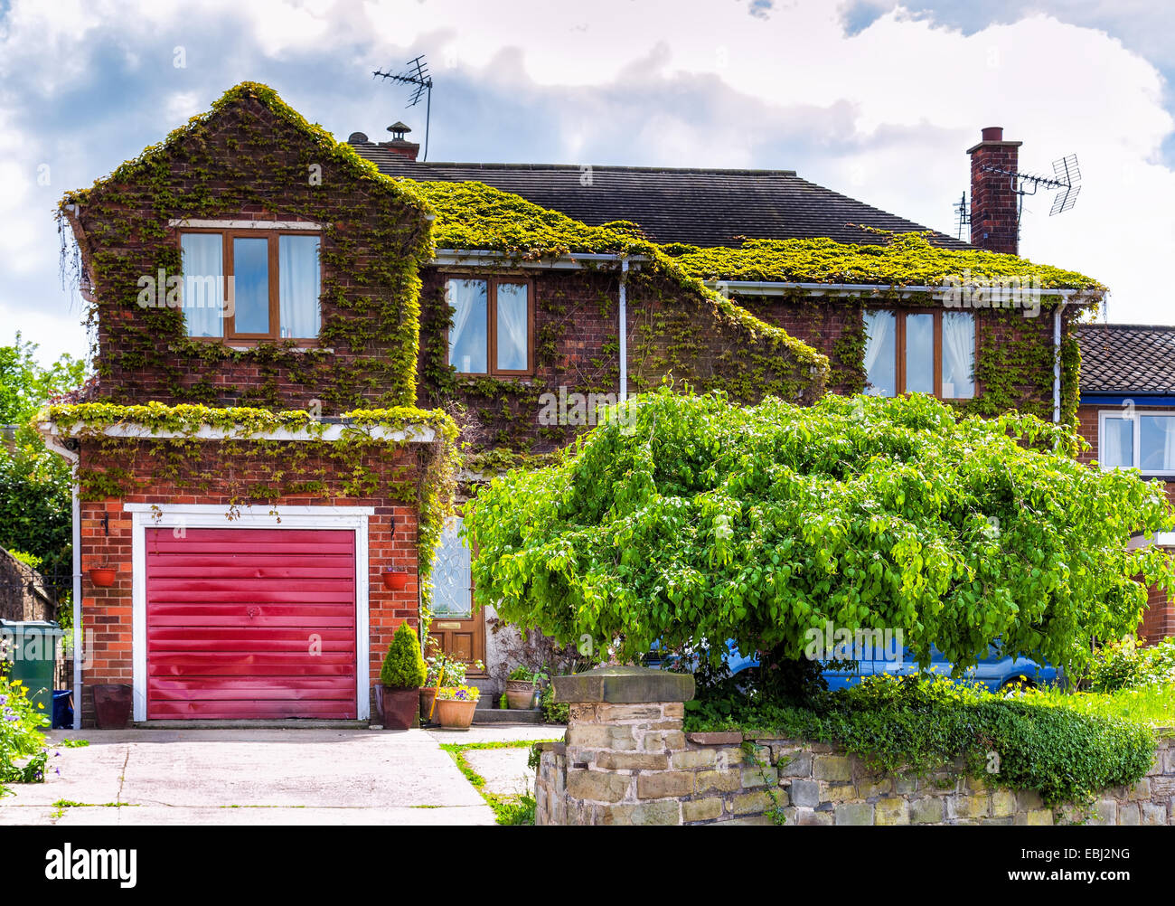 English house with garage Stock Photo - Alamy
