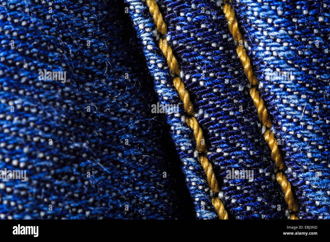 Horizontal macro close-up of denim jeans with fabric and seam Stock ...