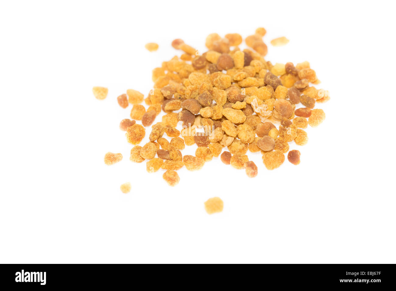 Top view of bee pollen against bright white background Stock Photo - Alamy