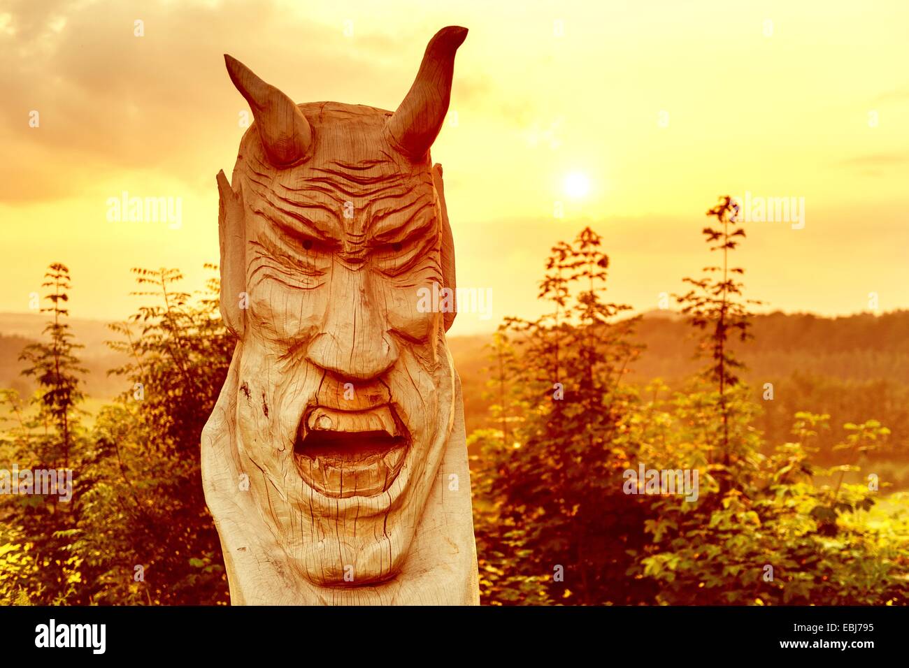 statue, devil, sunset Stock Photo - Alamy