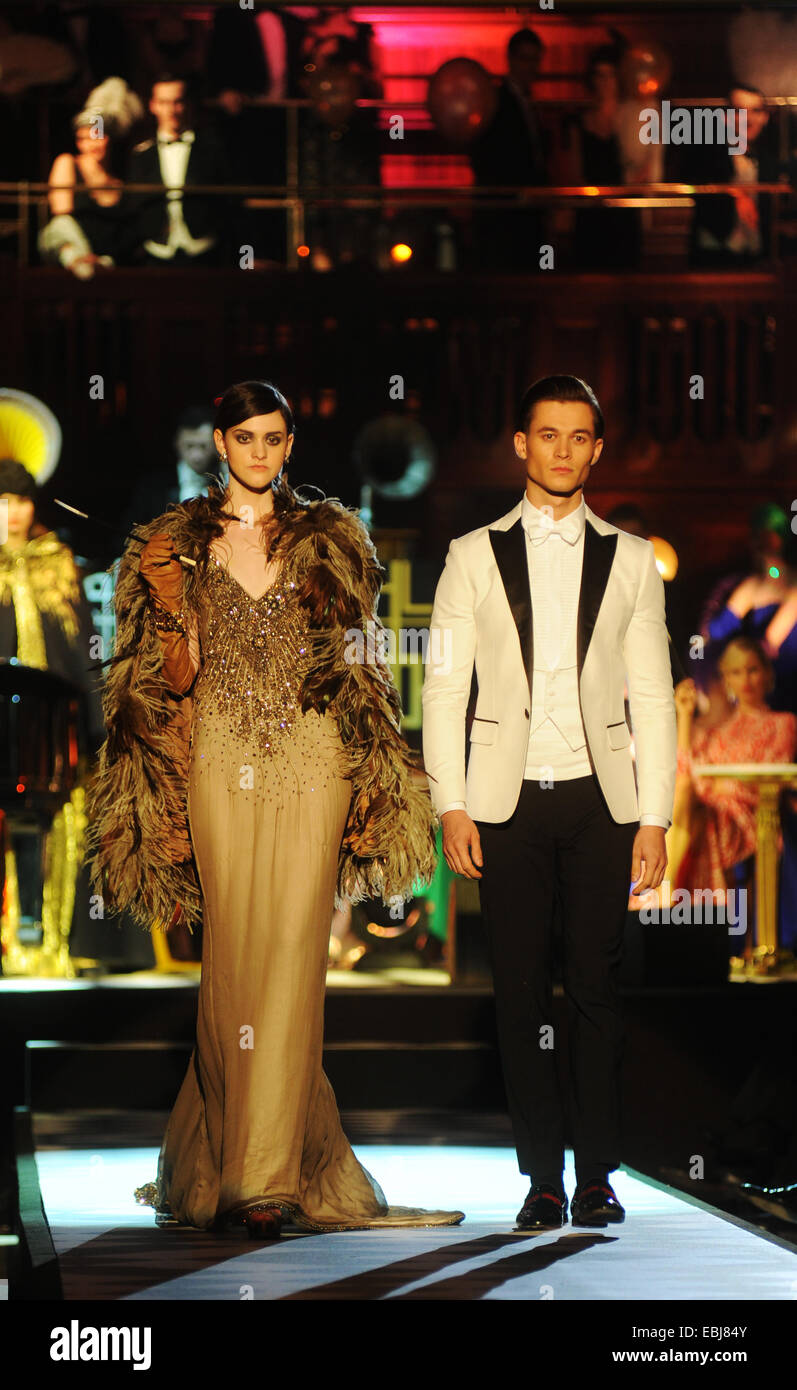Models present creations inspired by fashion of 30ies during charity ...