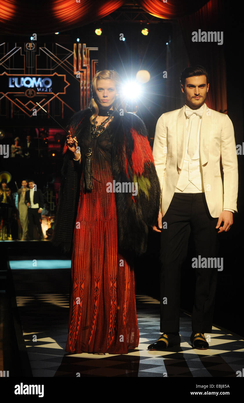 Models present creations inspired by fashion of 30ies during charity ...