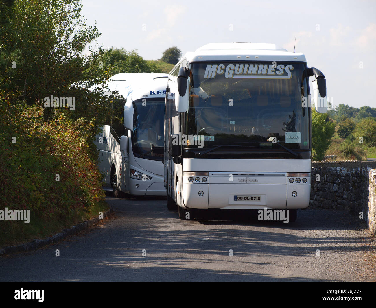 Tour buses awaiting return of passengers and departure at 'Clonmacnoise ...