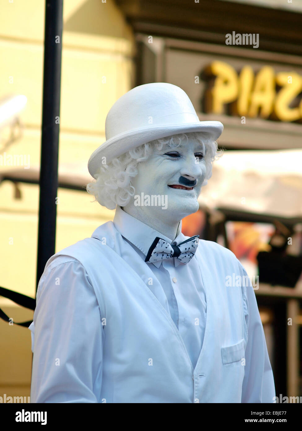 Lonely street mime performer clown Stock Photo - Alamy
