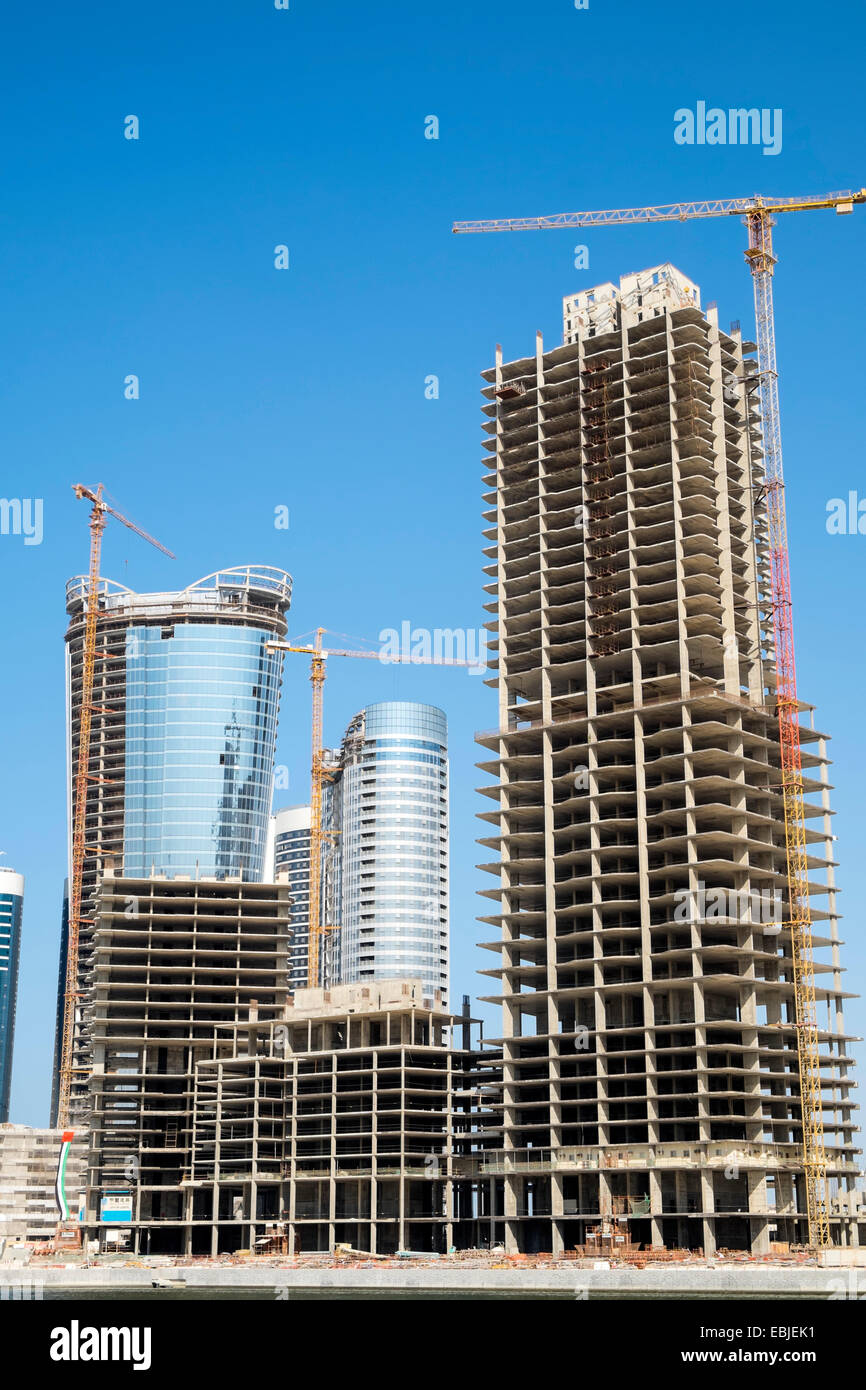 Modern high-rise residential and office buildings under construction at ...