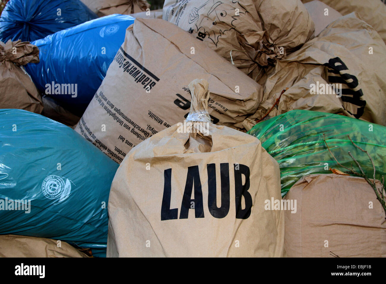 sacks full off autumn foliage ready to be taken to the composting plant ...