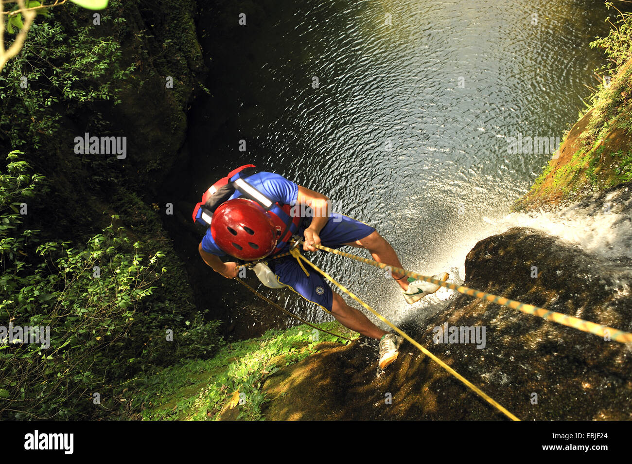 Rappelling waterfall woman hi-res stock photography and images - Alamy