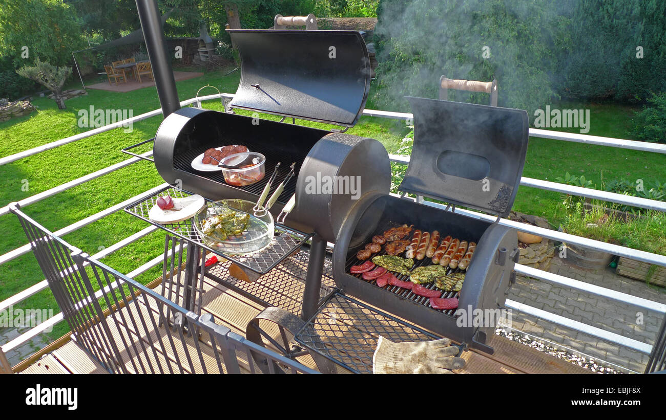 barbecue smoker on garden terraces, Germany Stock Photo - Alamy
