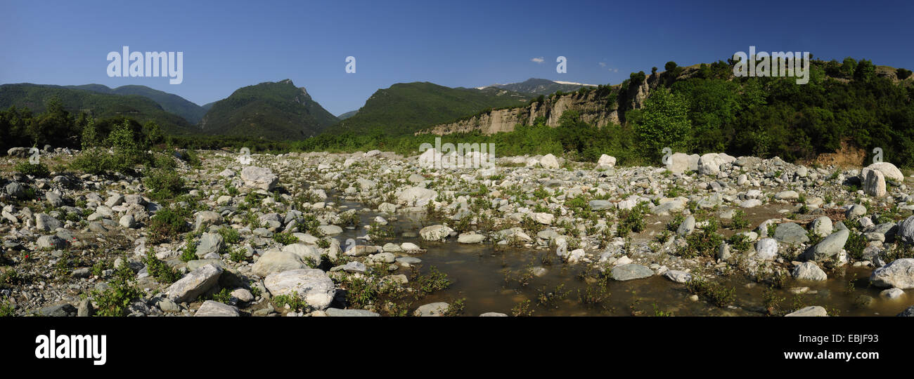 River bed covered with bolders at the foot of Mount Olympus, Greece ...