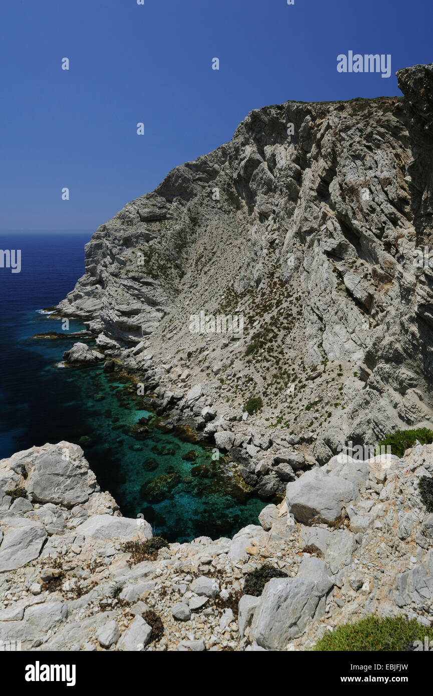 cliff-lined coast of the Island Pori in front of Antikythira, Greece ...
