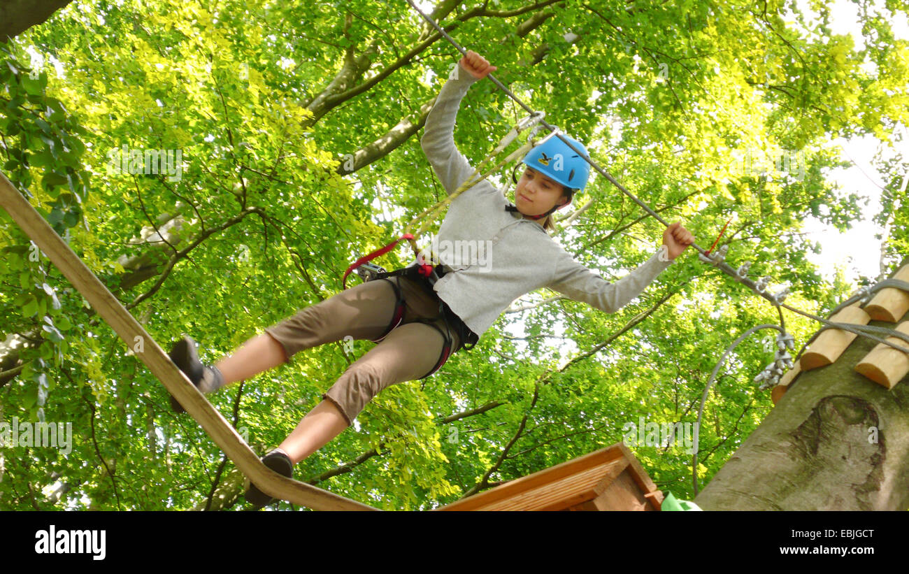Girl balancing on rope hi-res stock photography and images - Alamy