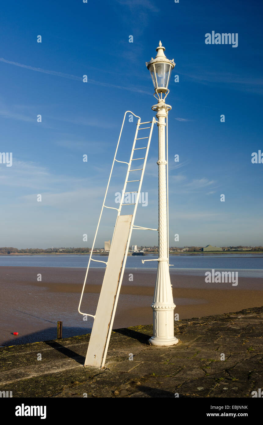 Old fashioned lamp post on the harbour wall at Lydney Harbour on the ...