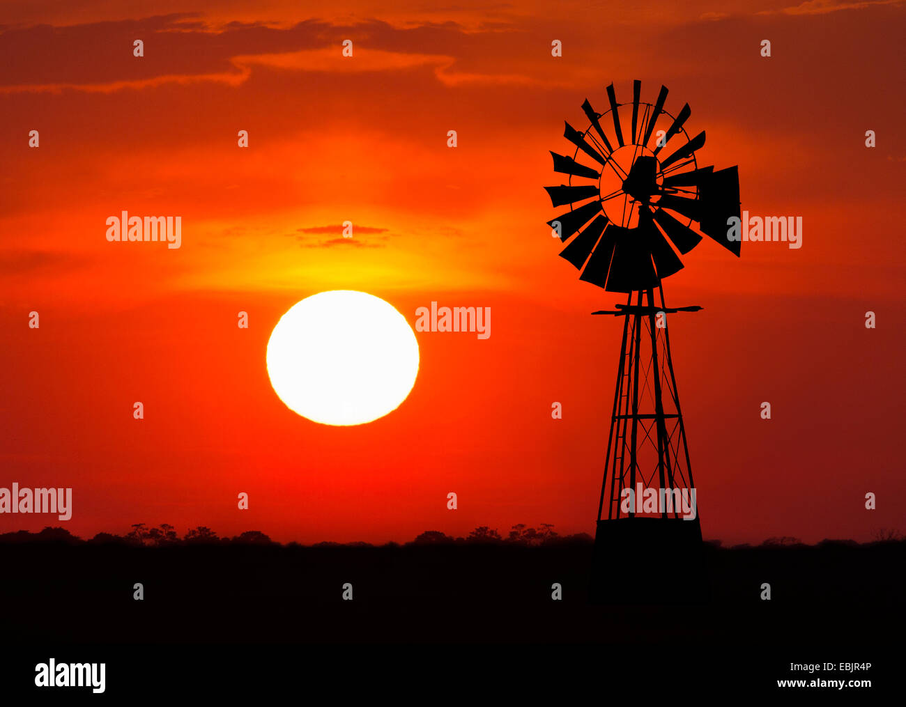 Windmill at sunset, Namibia Stock Photo - Alamy