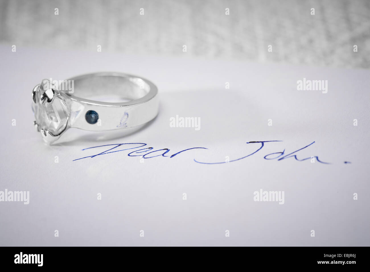 Returned engagement ring on a Dear John letter Stock Photo - Alamy