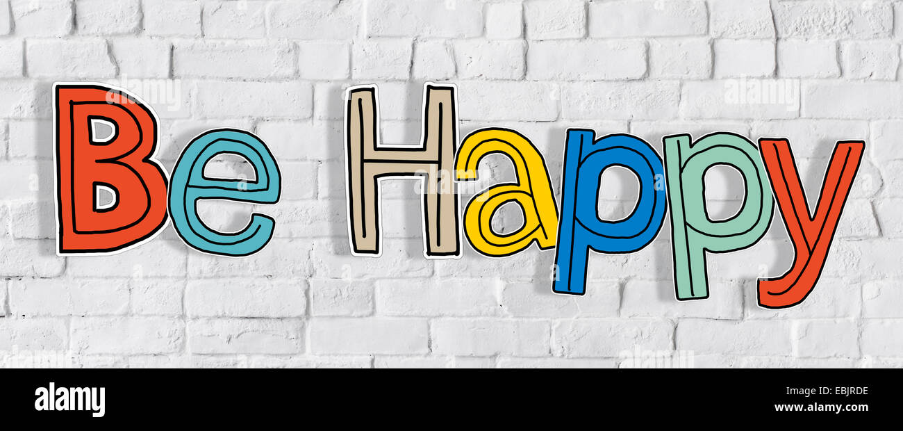Be Happy and Brick Wall in the Back Stock Photo - Alamy