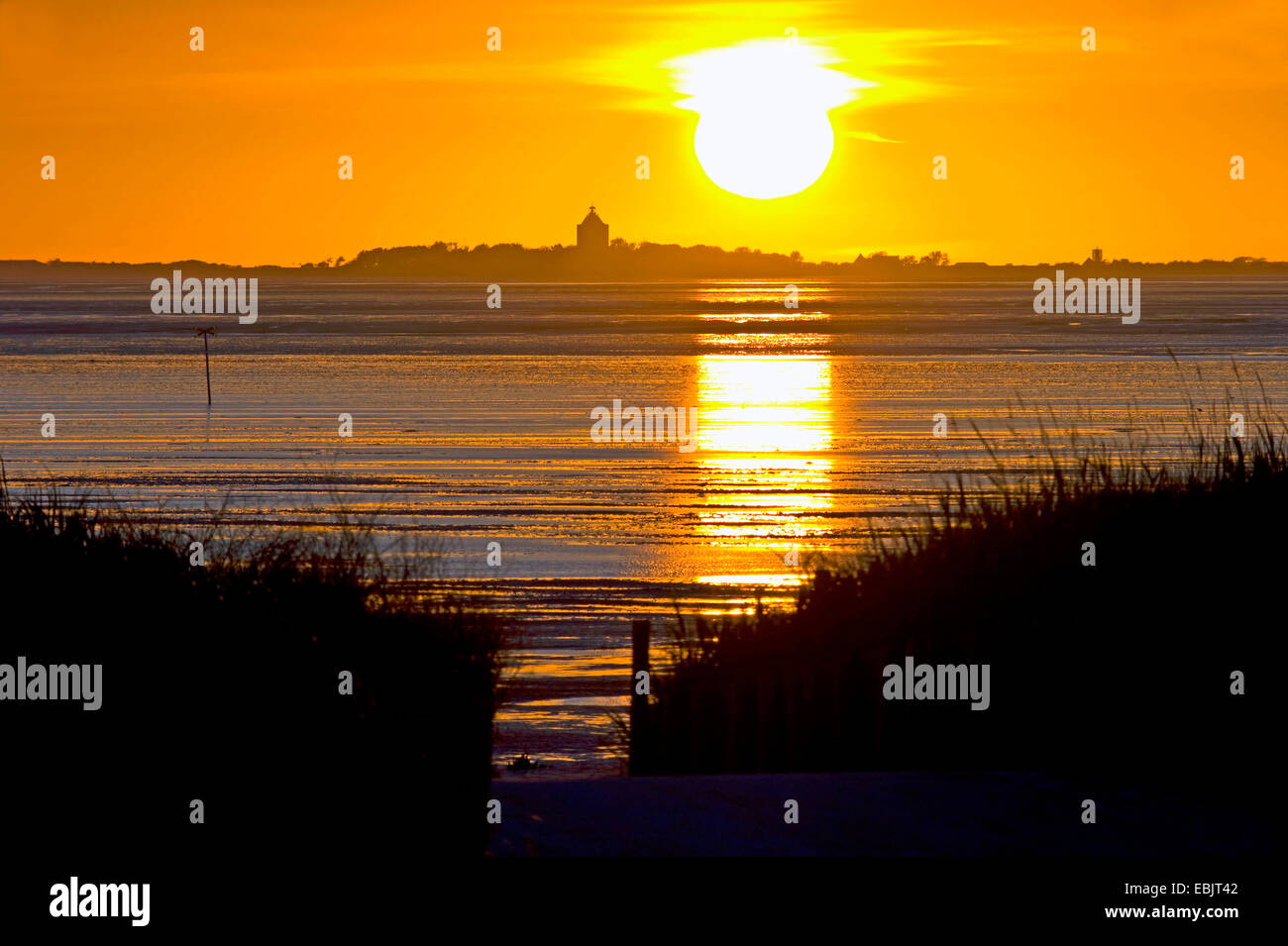 sunset in Wadden Sea near Cuxhaven Sahlenburg. view to island Neuwerk ...