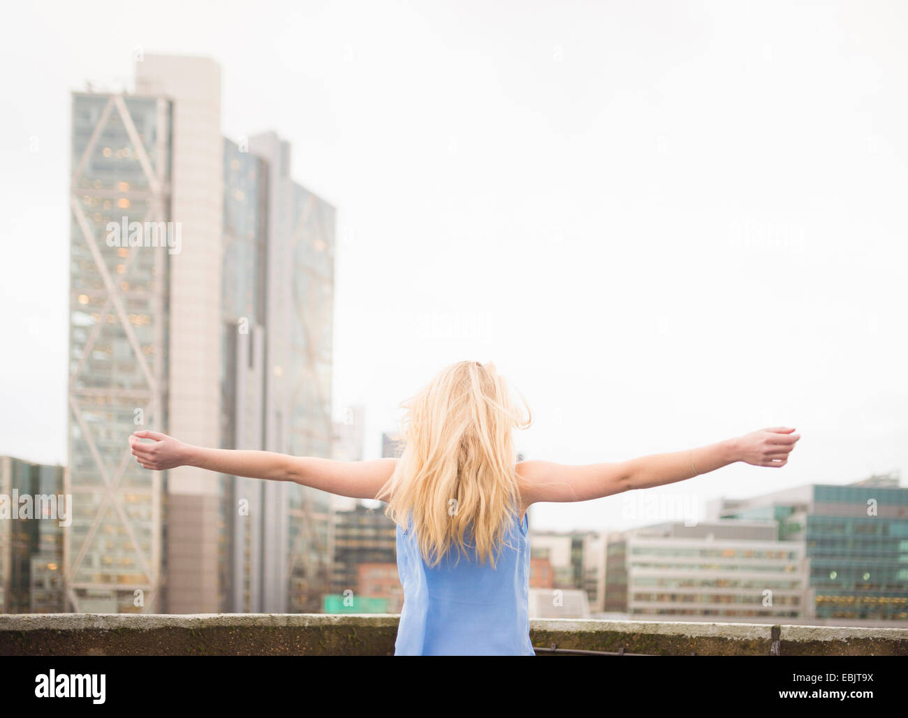 Woman open arms rear hi-res stock photography and images - Alamy