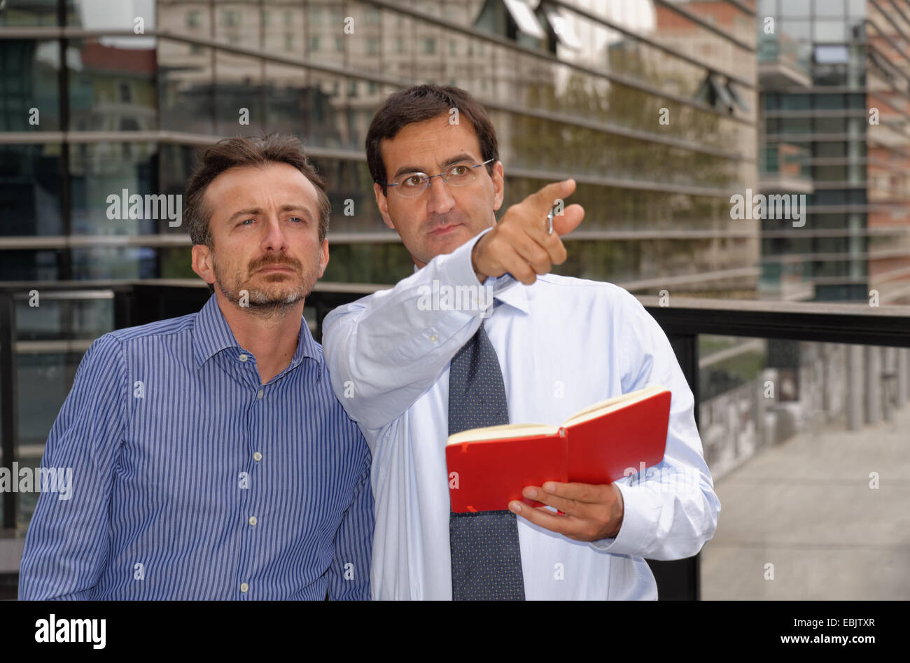 Two men pointing hi-res stock photography and images - Alamy