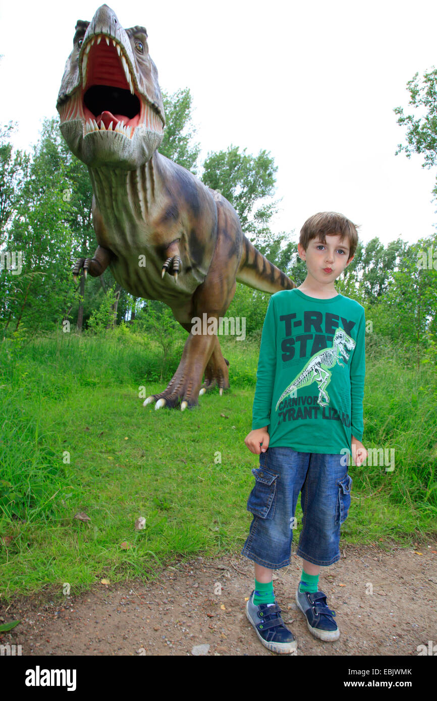 Tyrannosaurus (Tyrannosaurus rex), cool little boy beside by T-rex ...