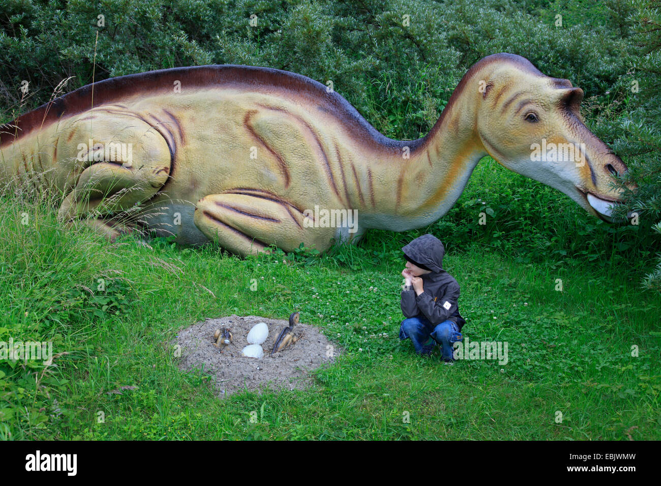 Edmontosaurus, Anatosaurus (Edmontosaurus, Anatosaurus), child sitting ...