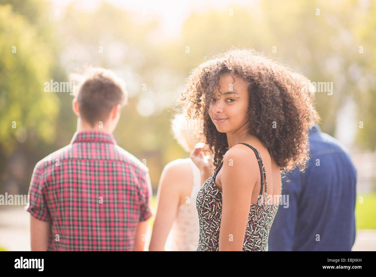 Teenage boy looking over shoulder hi-res stock photography and images ...