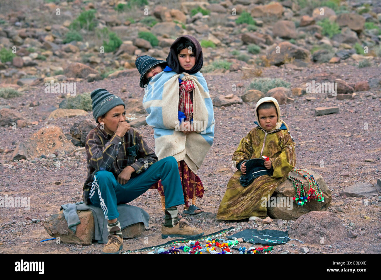poor children want to sell something in the desert, Morocco, Souss ...