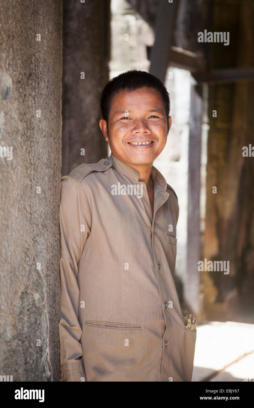 Cambodia man standing by temple, Siem Reap, Cambodia Stock Photo - Alamy